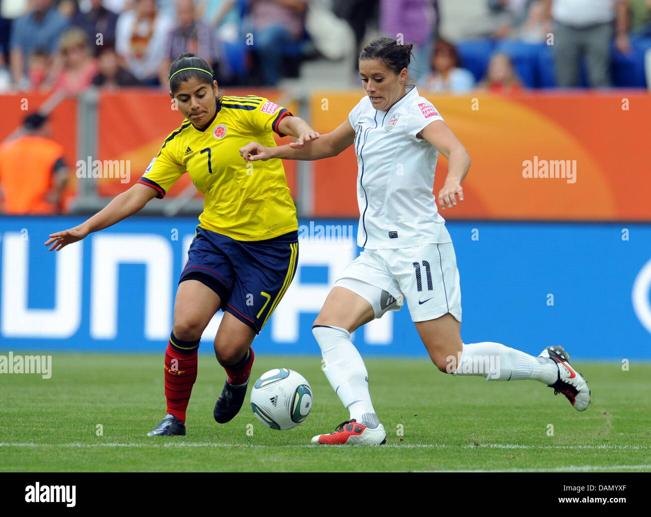 Alex Krieger (R) of USA and Catalina Usme of Colombia fight for the ...
