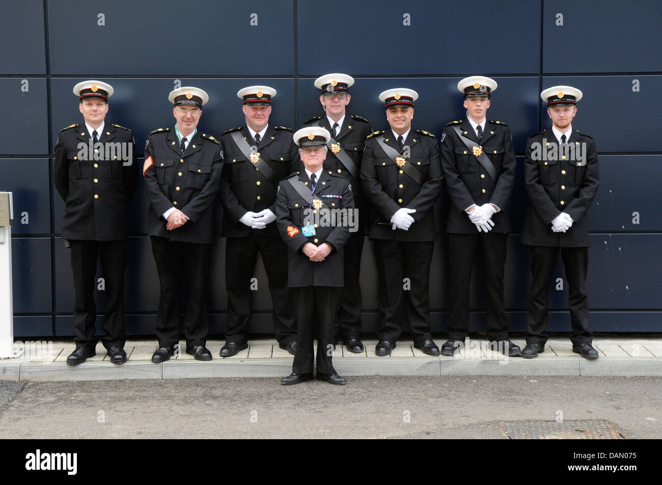 Eight uniformed security guards posing for a group photograph Stock ...