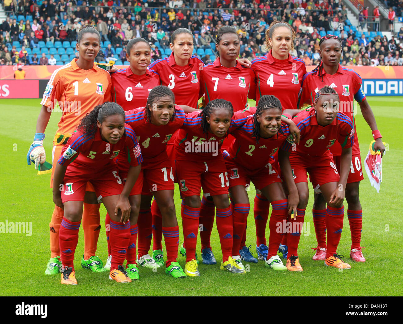 The starting line-up of Equatorial Guinea smiles for a group photo ...
