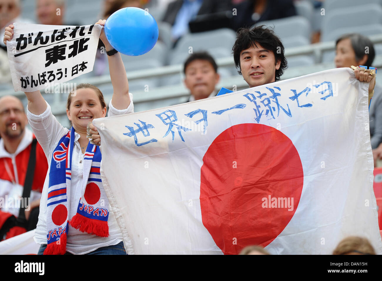 Fans of Japan's women's national soccer team cheer for their squad ...