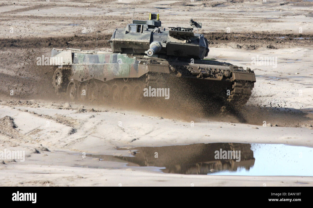 An undated picture shows a Leopard 2 main battle tank driving at the ...