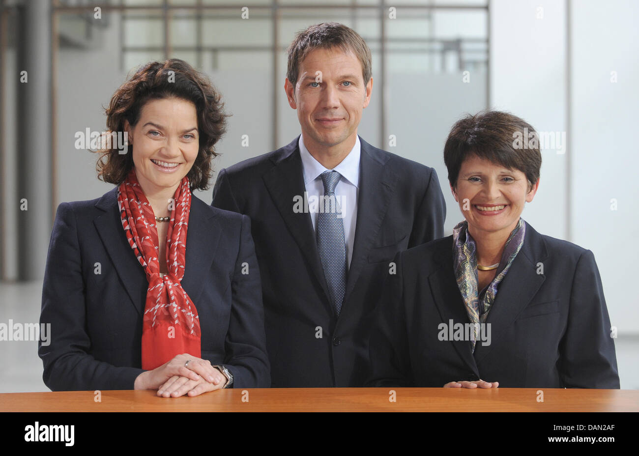 The head of Telekom, Rene Obermann (m) arrives for a press conference ...