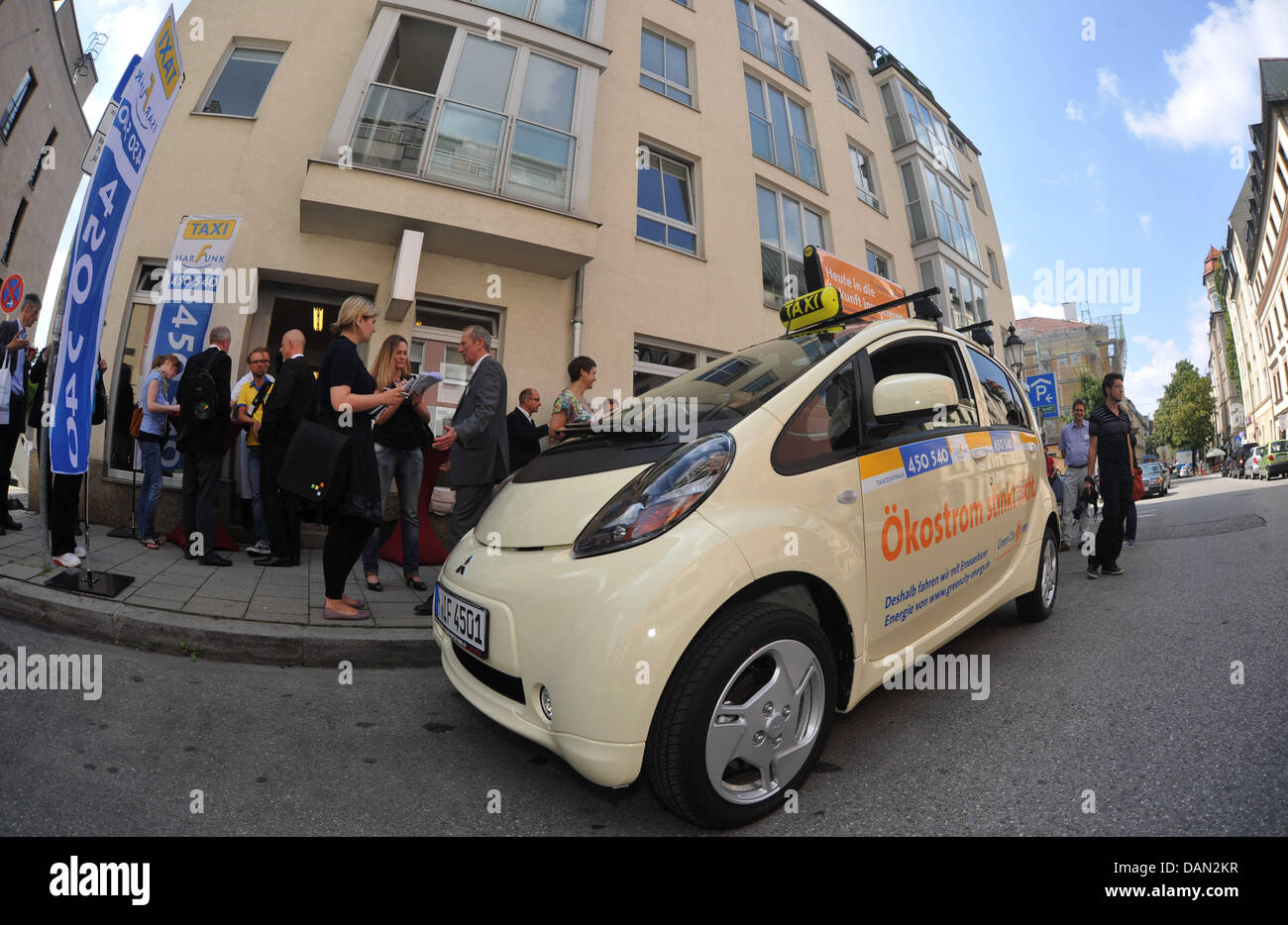 The first German electric taxi stands in front of a taxi office in ...