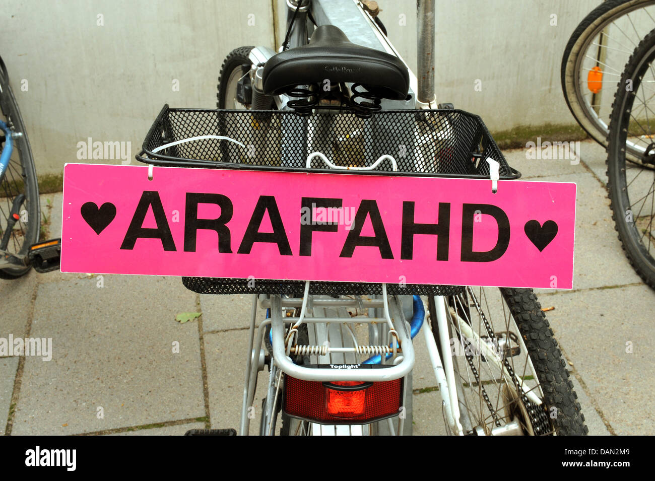 A sign that mispells the German word 'Fahrrad' (Bicycle) is attached to ...