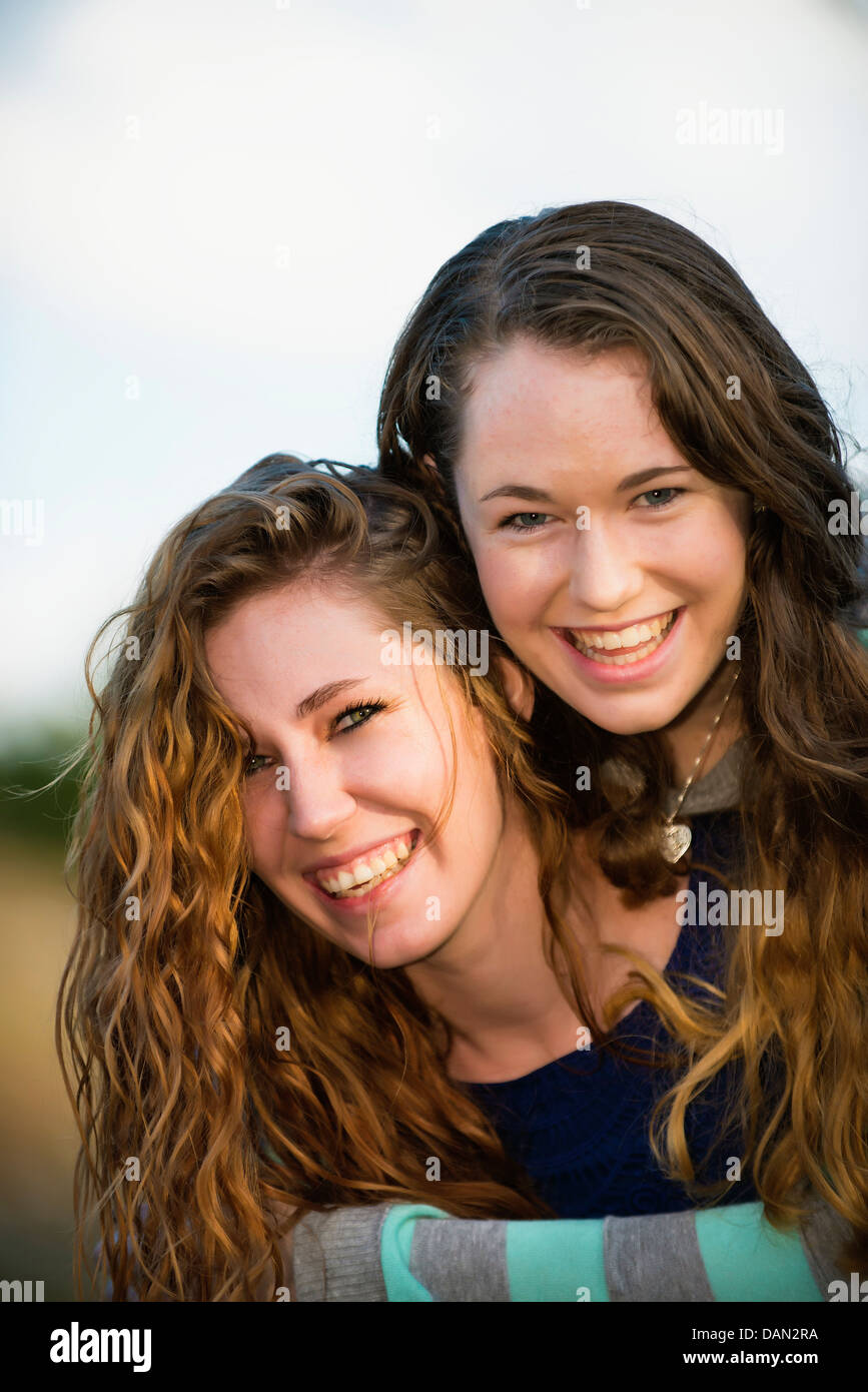USA, Texas, Sisters smiling, portrait Stock Photo - Alamy