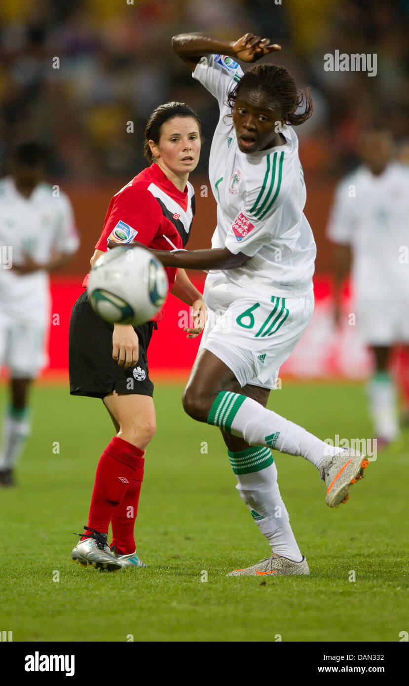 Helen Ukaonu (R) of Nigeria and Diana Matheson (L) of Canada fight for ...