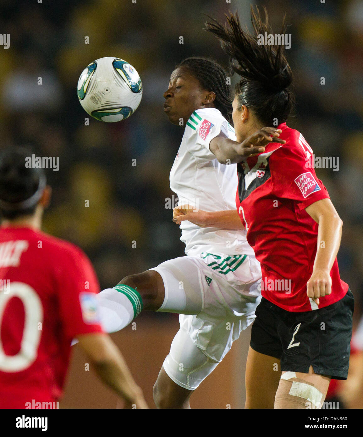 Uchechi Sunday (L) of Nigeria and Emily Zurrer of Canada (R) fight for ...