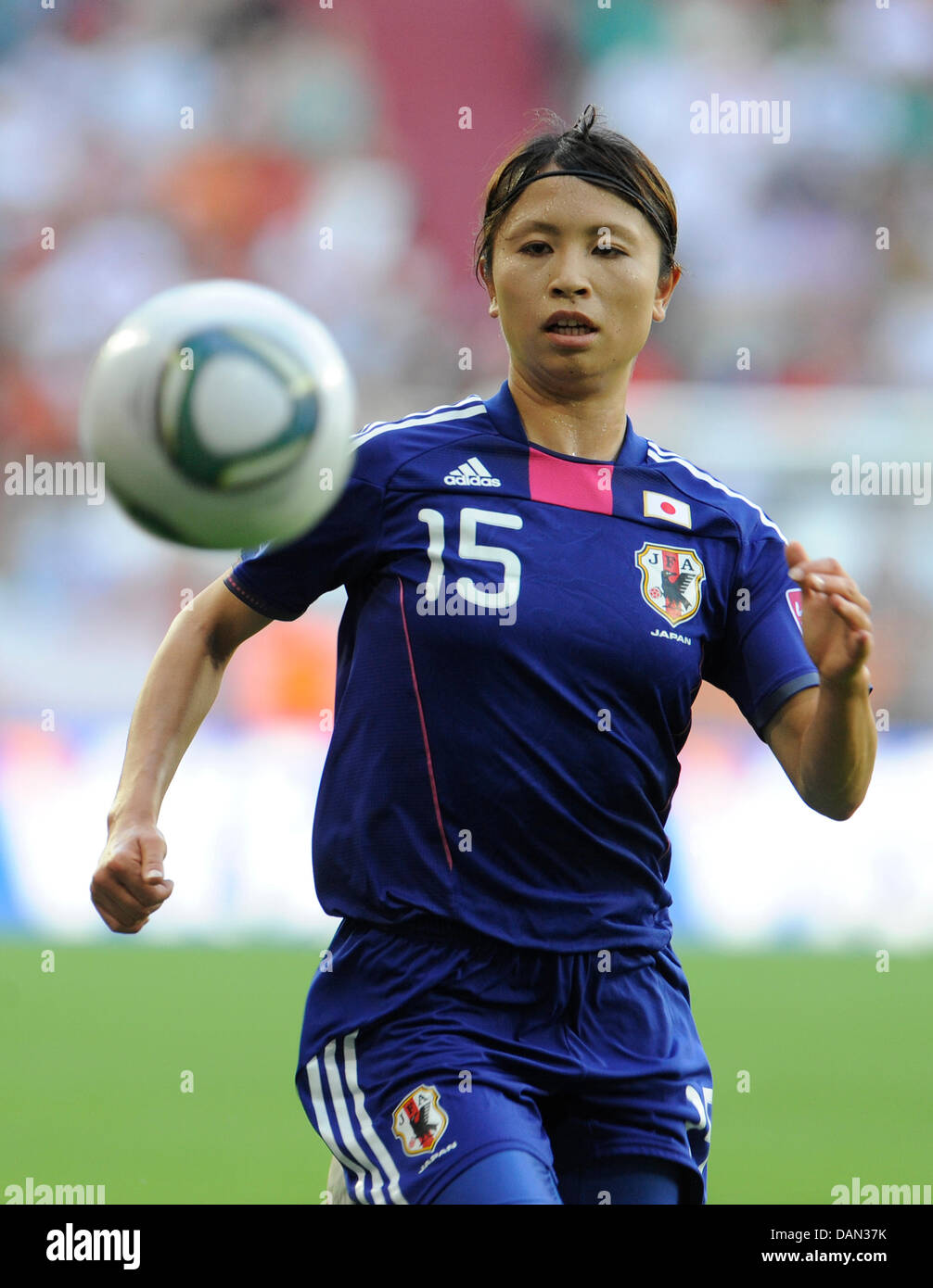 Aya Sameshima of Japan runs with the ball during the Group B match ...
