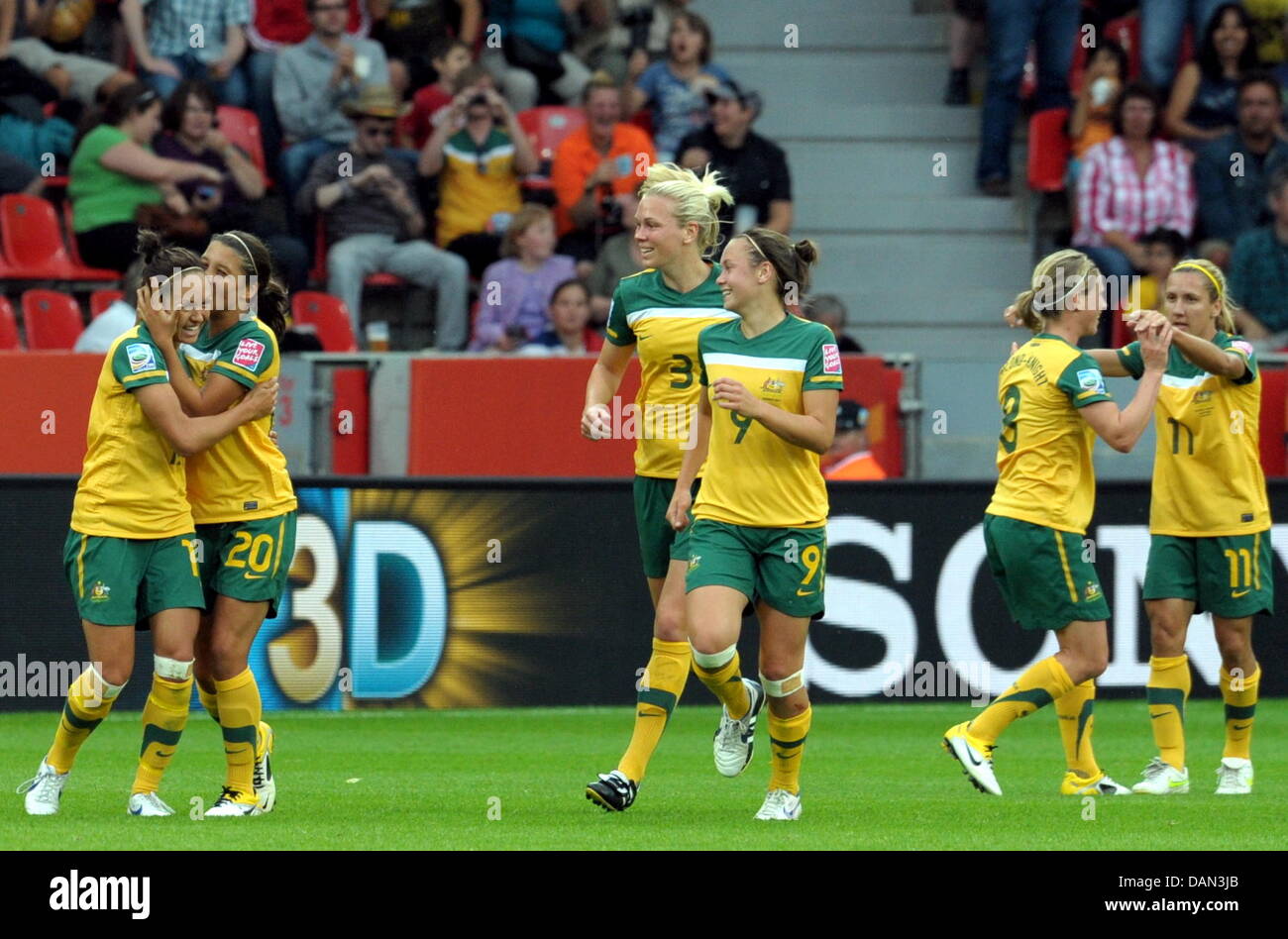 Australia's Kyah Simon (L) celebrates after scoring the 1-1 with team ...