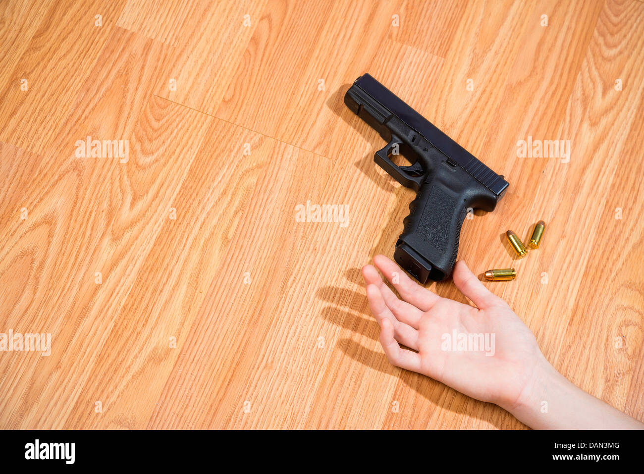 Woman lying on floor gun hi-res stock photography and images - Alamy