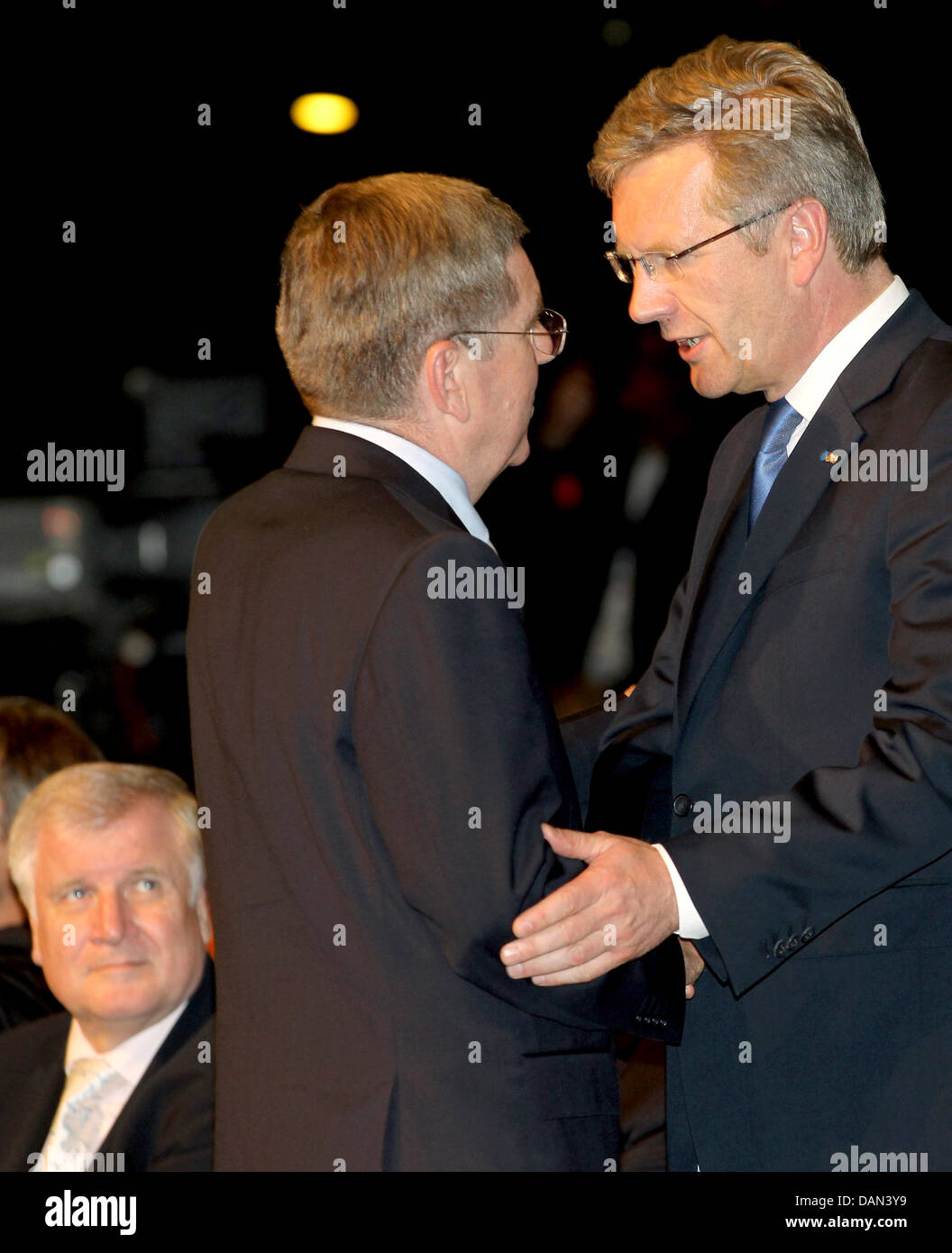 Bavaria's Premier Horst Seehofer, vice-president of the IOC Thomas Bach ...