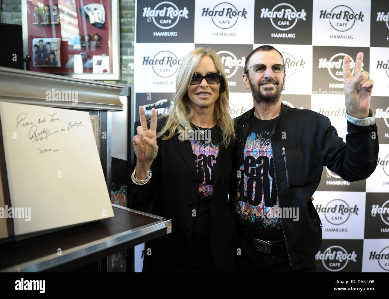Former Beatle Ringo Starr (R) and his wife Barbara pose inside the new ...