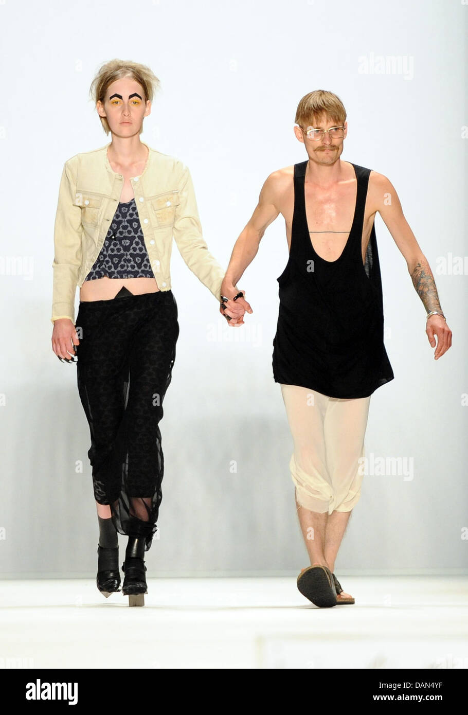 Designer Patrick Mohr with a model after his show during the Mercedes ...