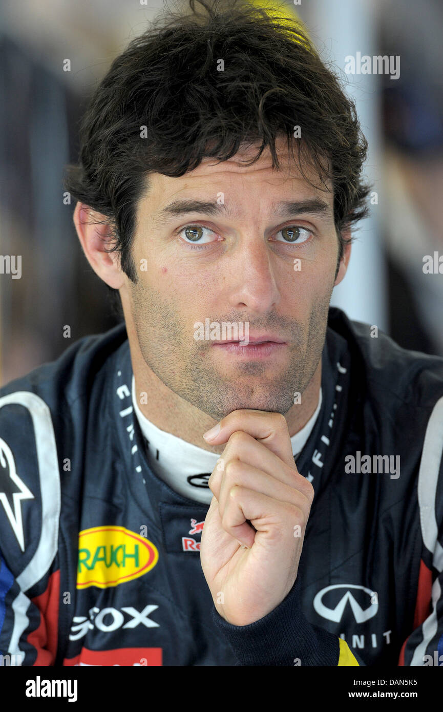 Australian Formula One driver Mark Webber of Red Bull stands in the ...