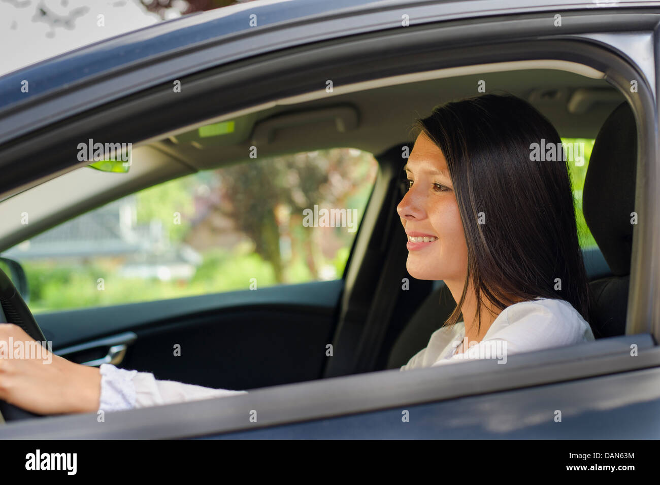 woman driving in car Stock Photo - Alamy