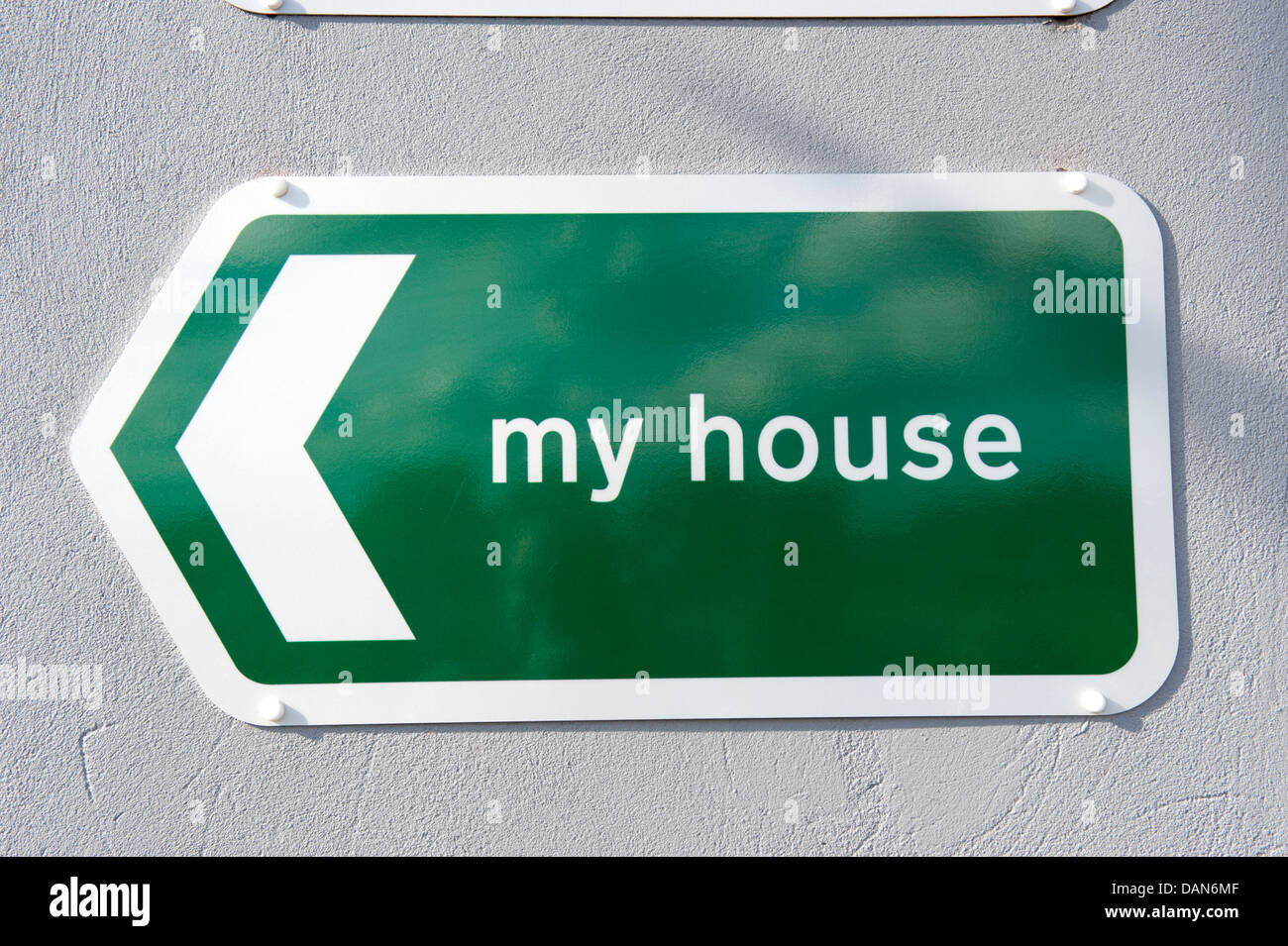 Sign My House Arrow Left Green White Stock Photo - Alamy