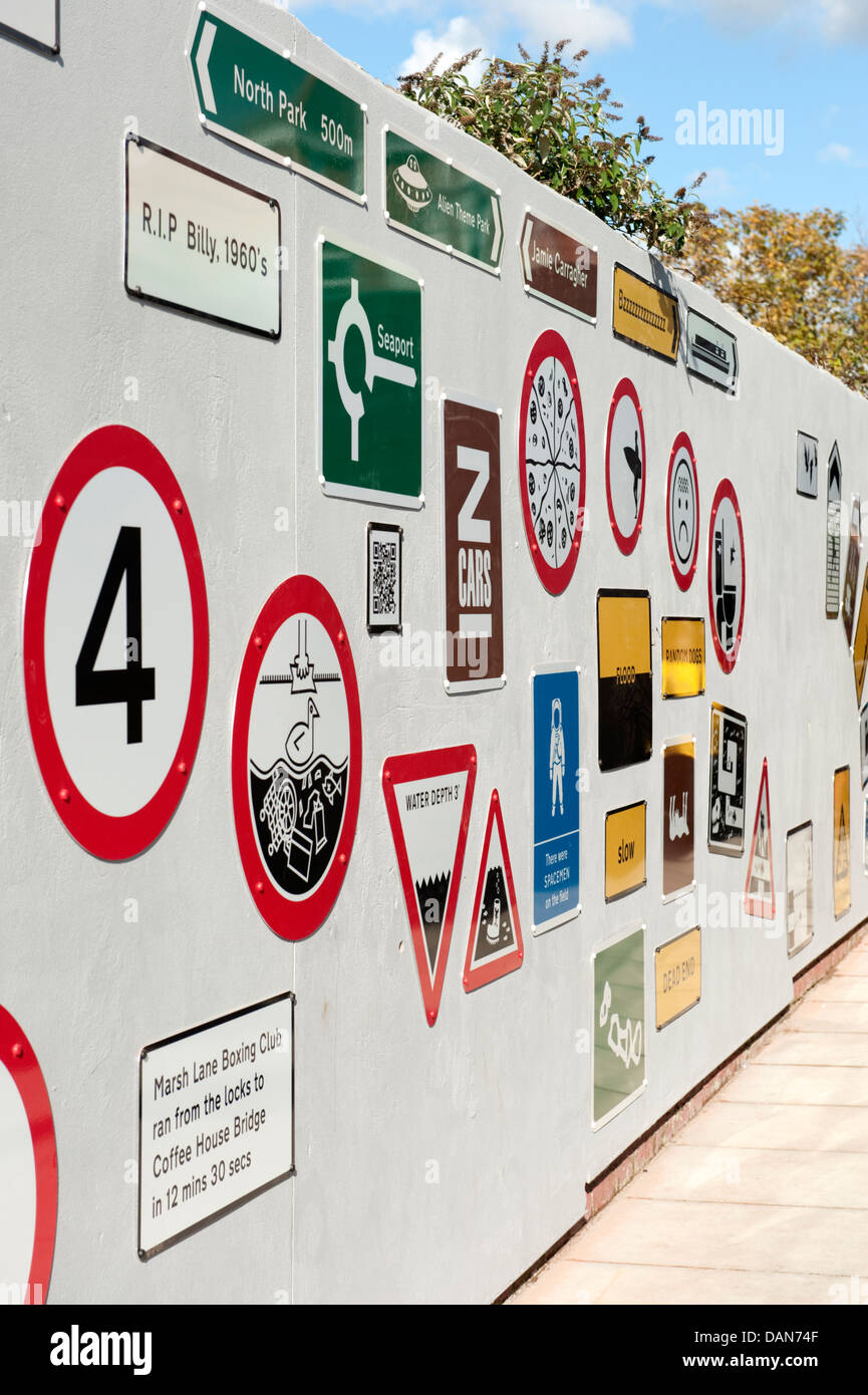 Wall covered in warning signs hundreds of them Stock Photo - Alamy