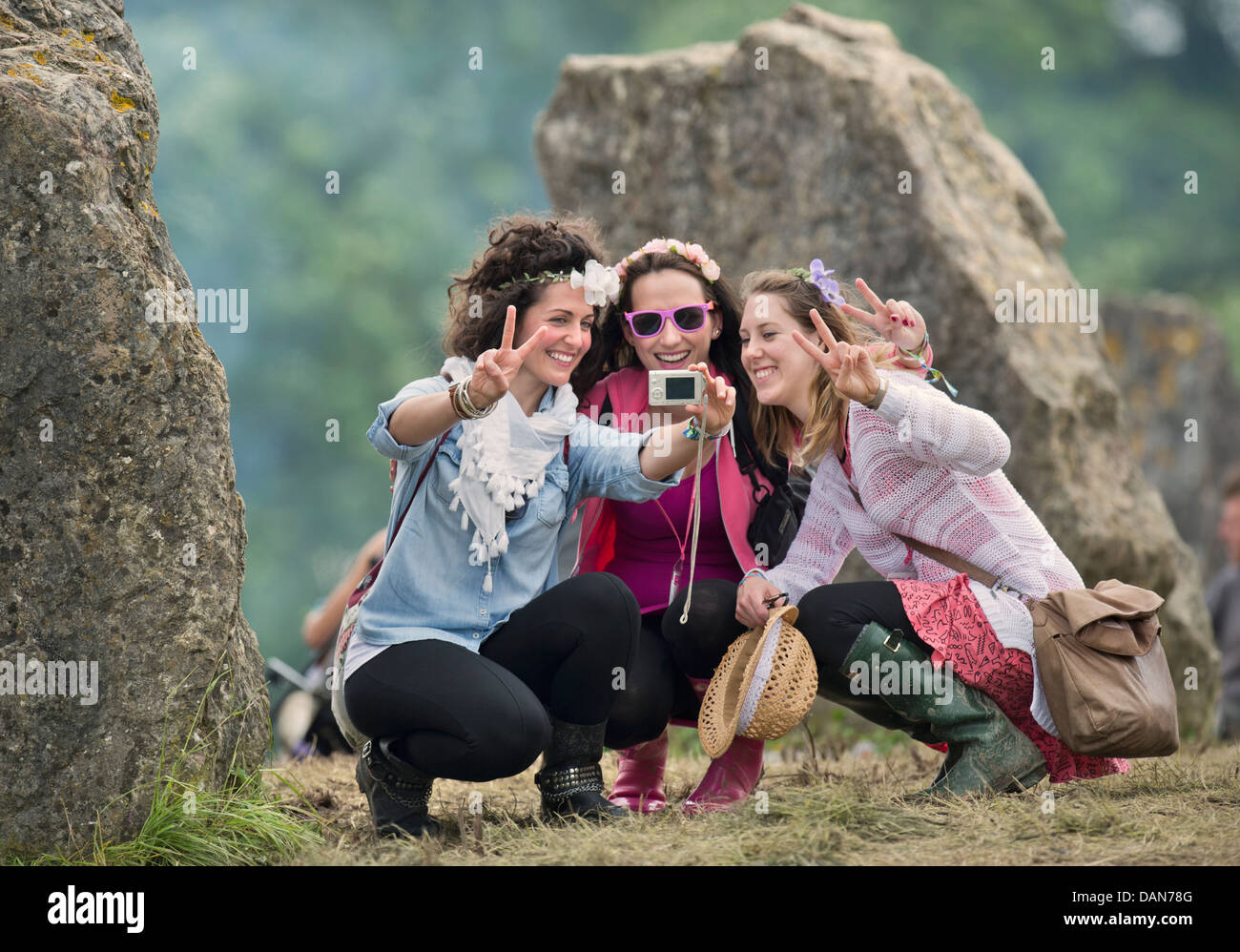 Glastonbury Festival 2013 UK A group of three girls record the moment ...