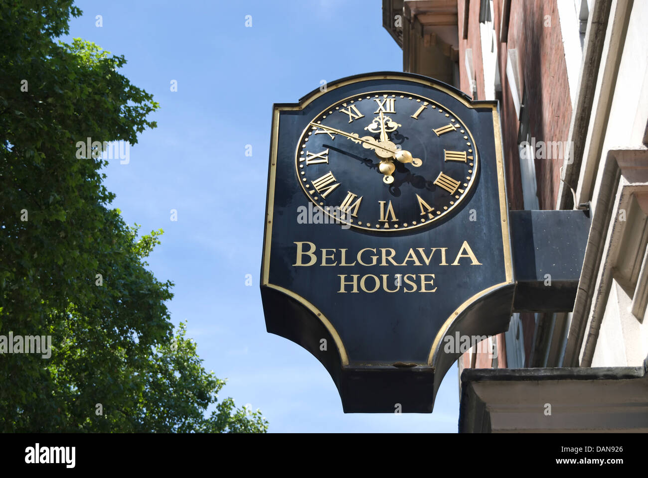 hanging clock outside belgravia house, horseferry road, westminster ...