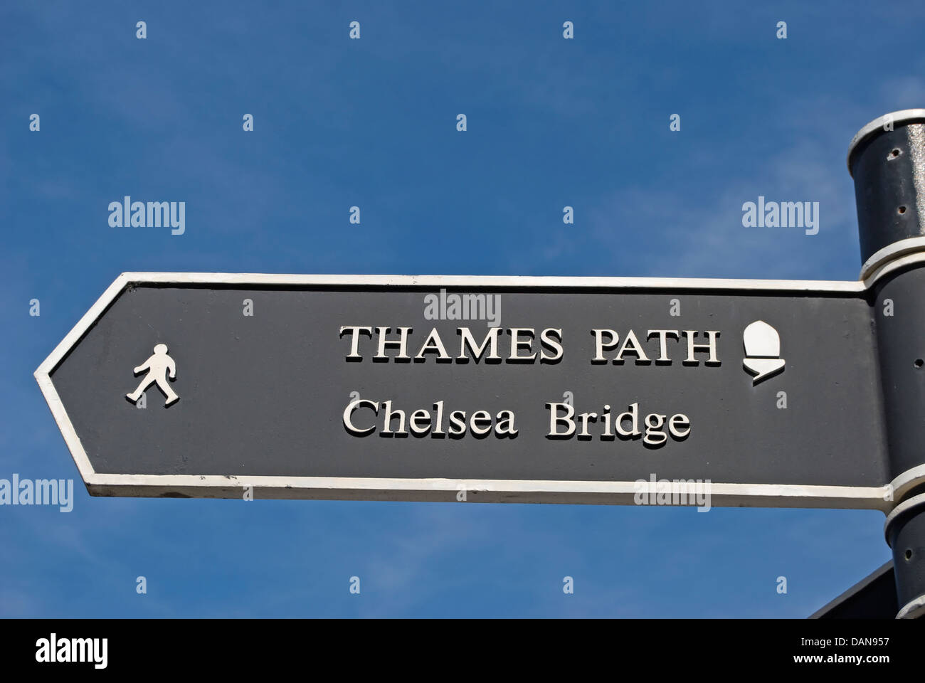 sign for the river thames path with directions for chelsea bridge, in ...