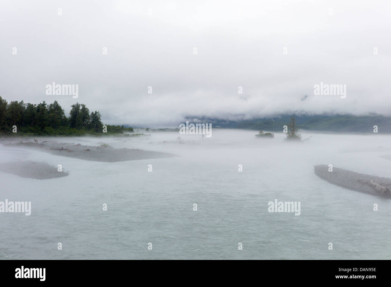 Foggy misty weather over the Valdez Glacier Stream, a river just ...