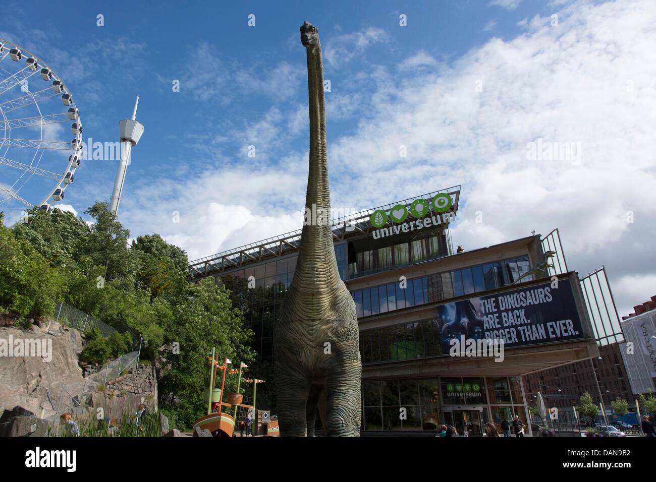 life-size dinosaur in front of the museum for world cultures in ...