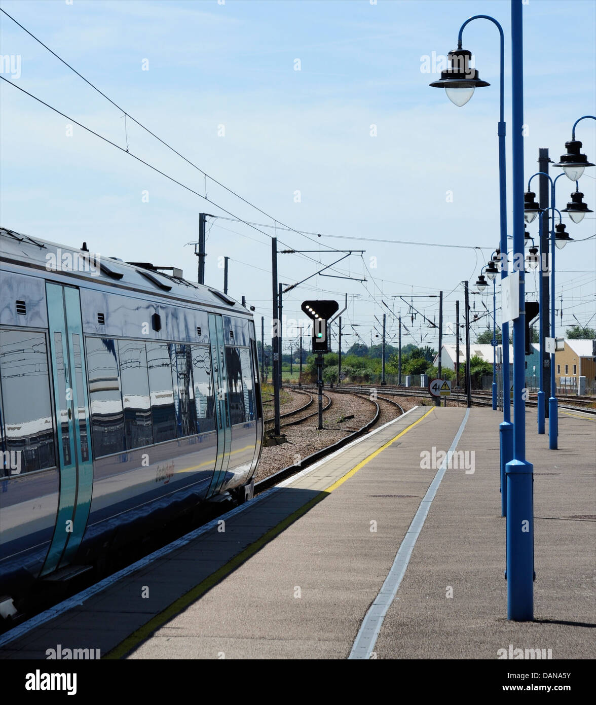 Turbostar number 170207 leaving Platform 3 at Ely station with a train ...