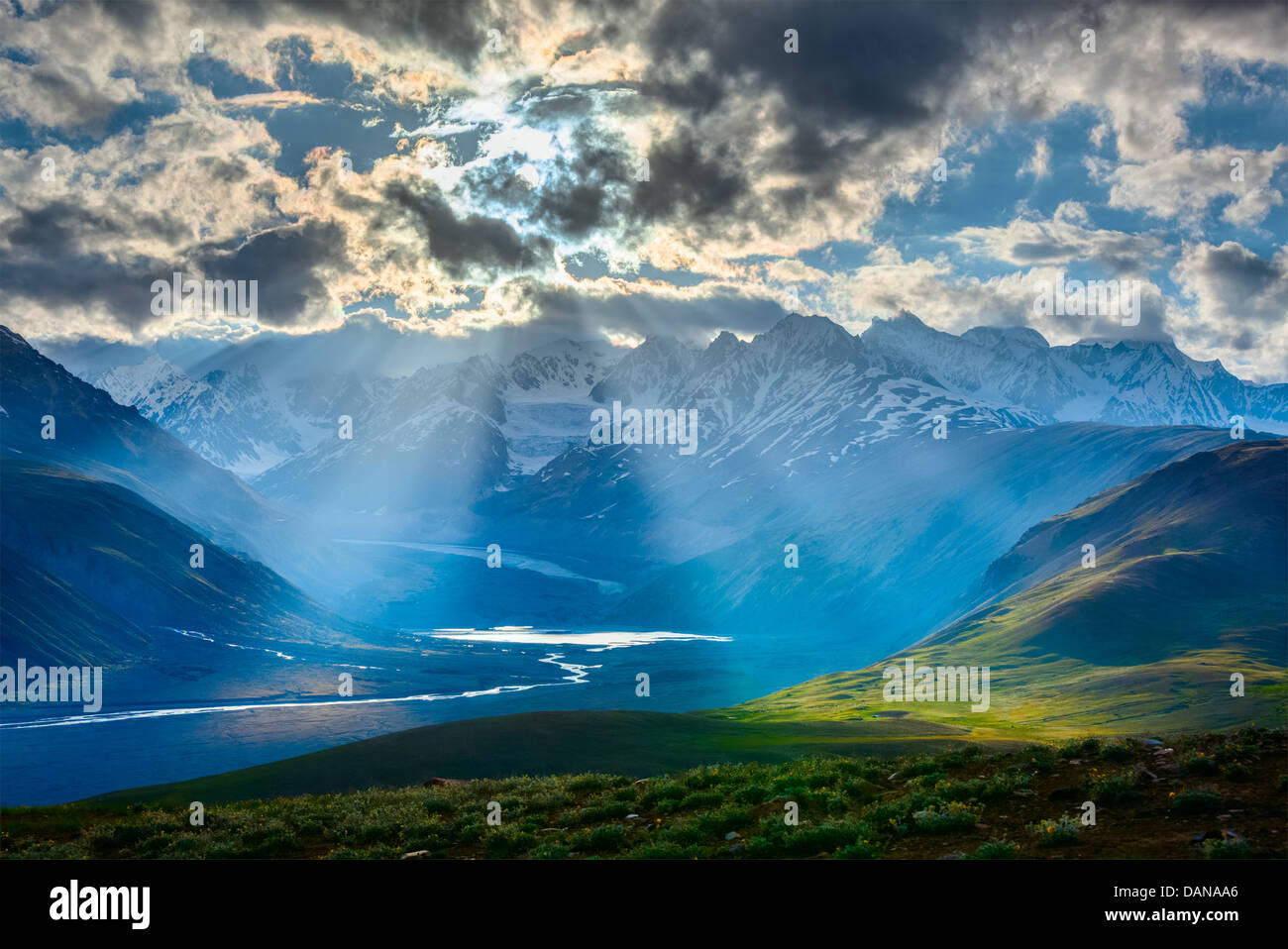 HImalayan valley landscape with Himalayas mountains. Sun rays come ...