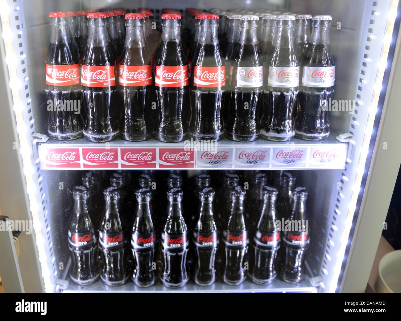 Bottles of coke stand in a cooler in the company headquarters on ...