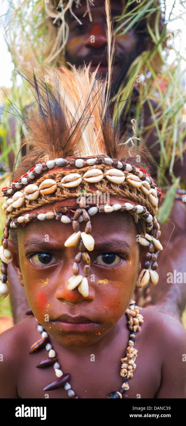 Young boy wearing shell crown and necklace at the Goroka Show, Papua ...