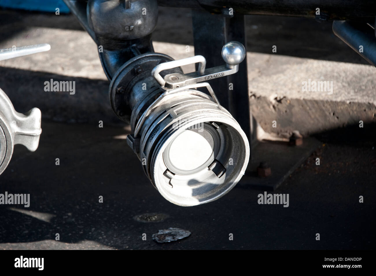 Oil Refinery road tanker loading filling hose Gas Stock Photo - Alamy