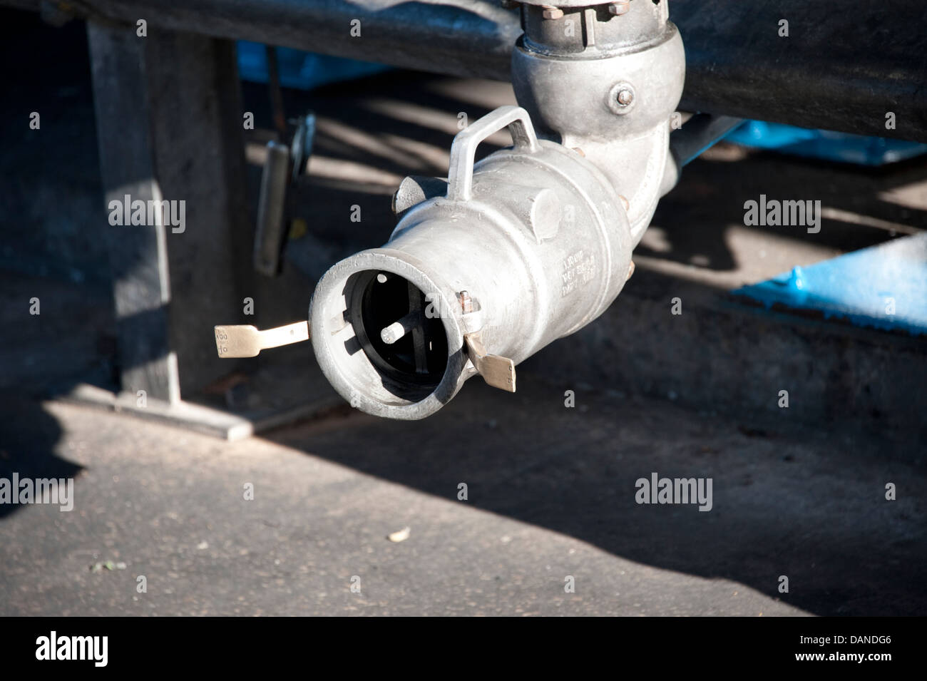 Oil Refinery road tanker loading filling hose Gas Stock Photo - Alamy