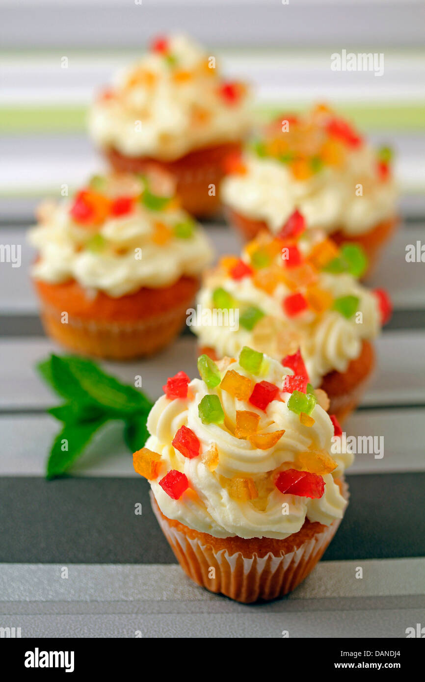 Cupcakes with candied fruit. Recipe available Stock Photo - Alamy