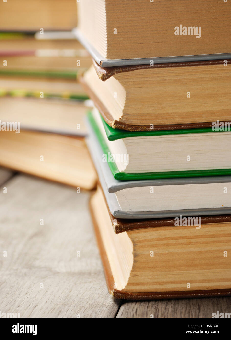 Many books on the wooden table Stock Photo - Alamy
