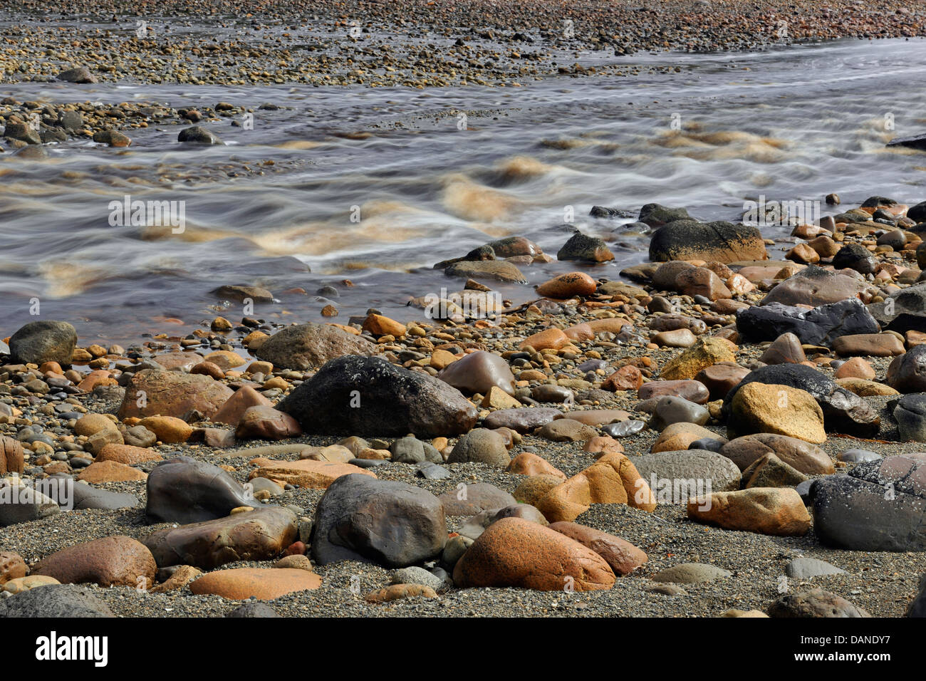 A stream enters Hecate Strait Haida Gwaii Queen Charlotte Islands ...