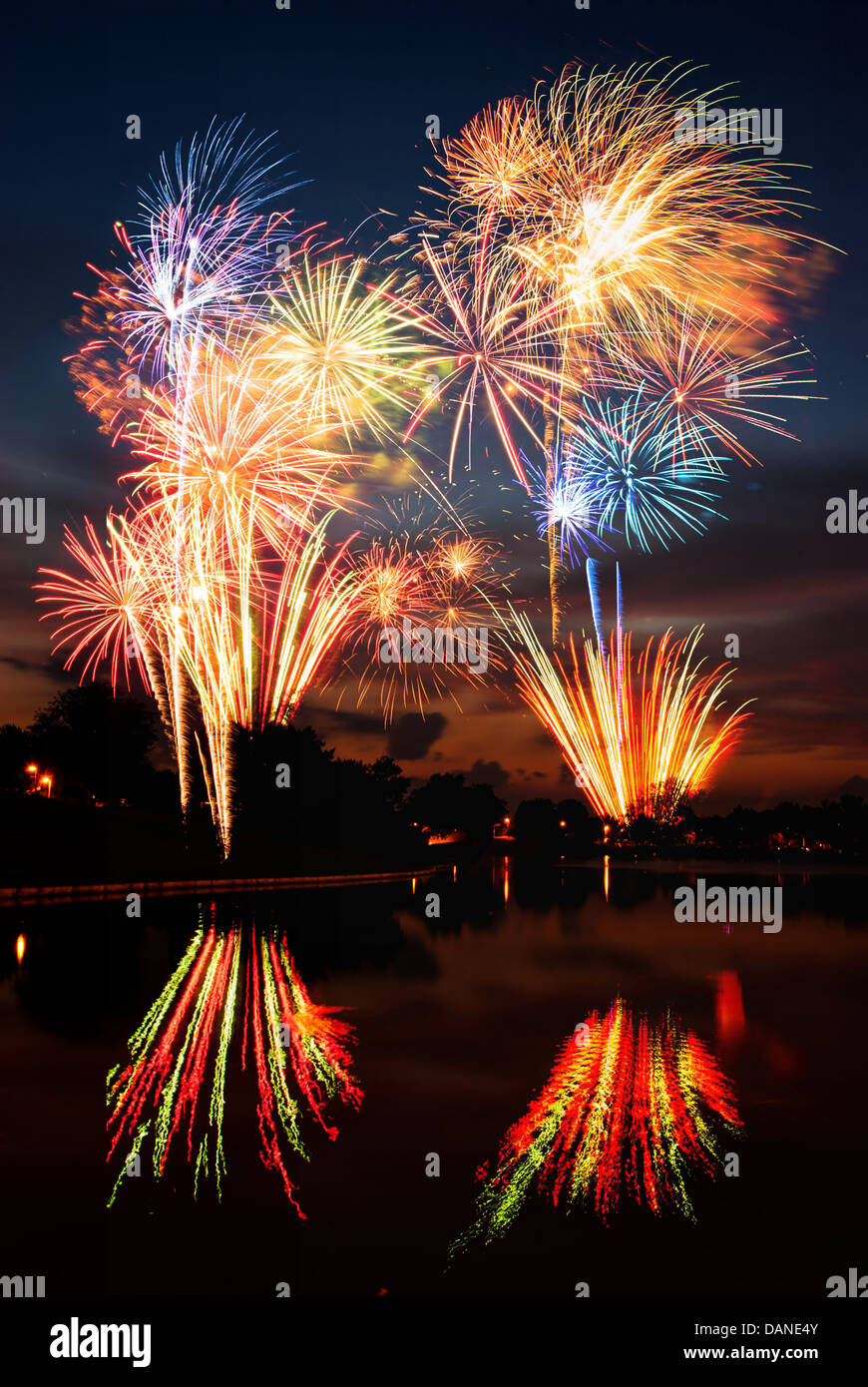 Firework streaks in the night sky. Spectacular pyrotechnic show by ...