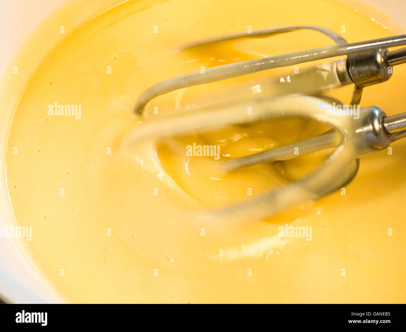 Cake Batter in Bowl with Vintage Beater Stock Photo - Alamy