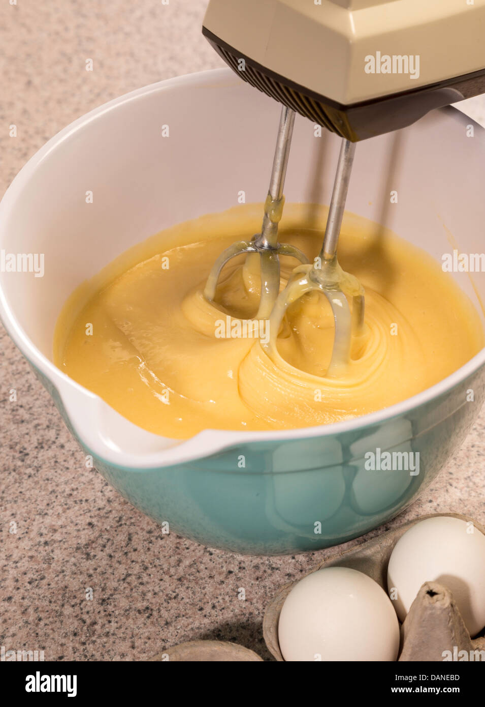 Cake Batter in Bowl with Vintage Beater Stock Photo - Alamy