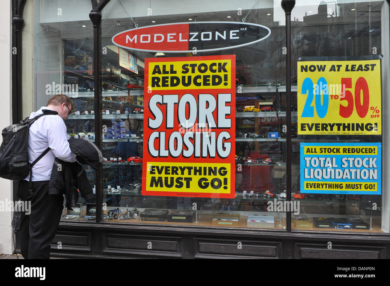 New Oxford Street, London, UK. 16th July 2013. A man looks in the ...