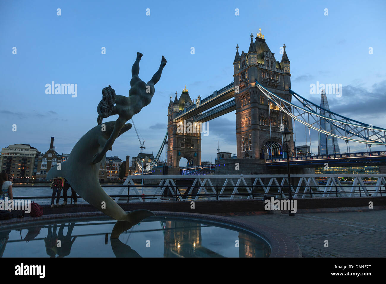 Girl with a dolphin, Bronze, Tower Bridge, London, UK Stock Photo - Alamy