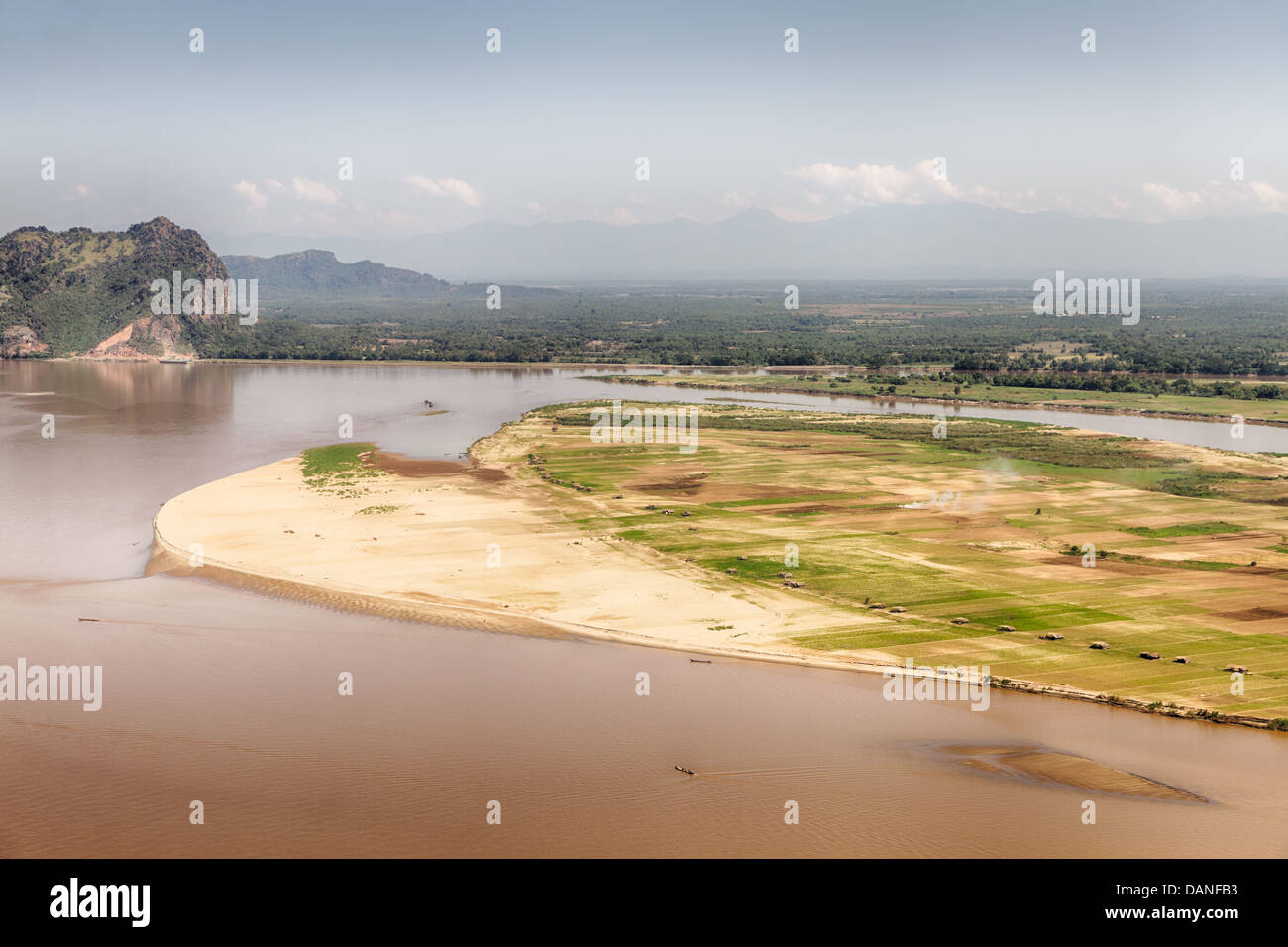 river delta with island and small village settlement in the green ...