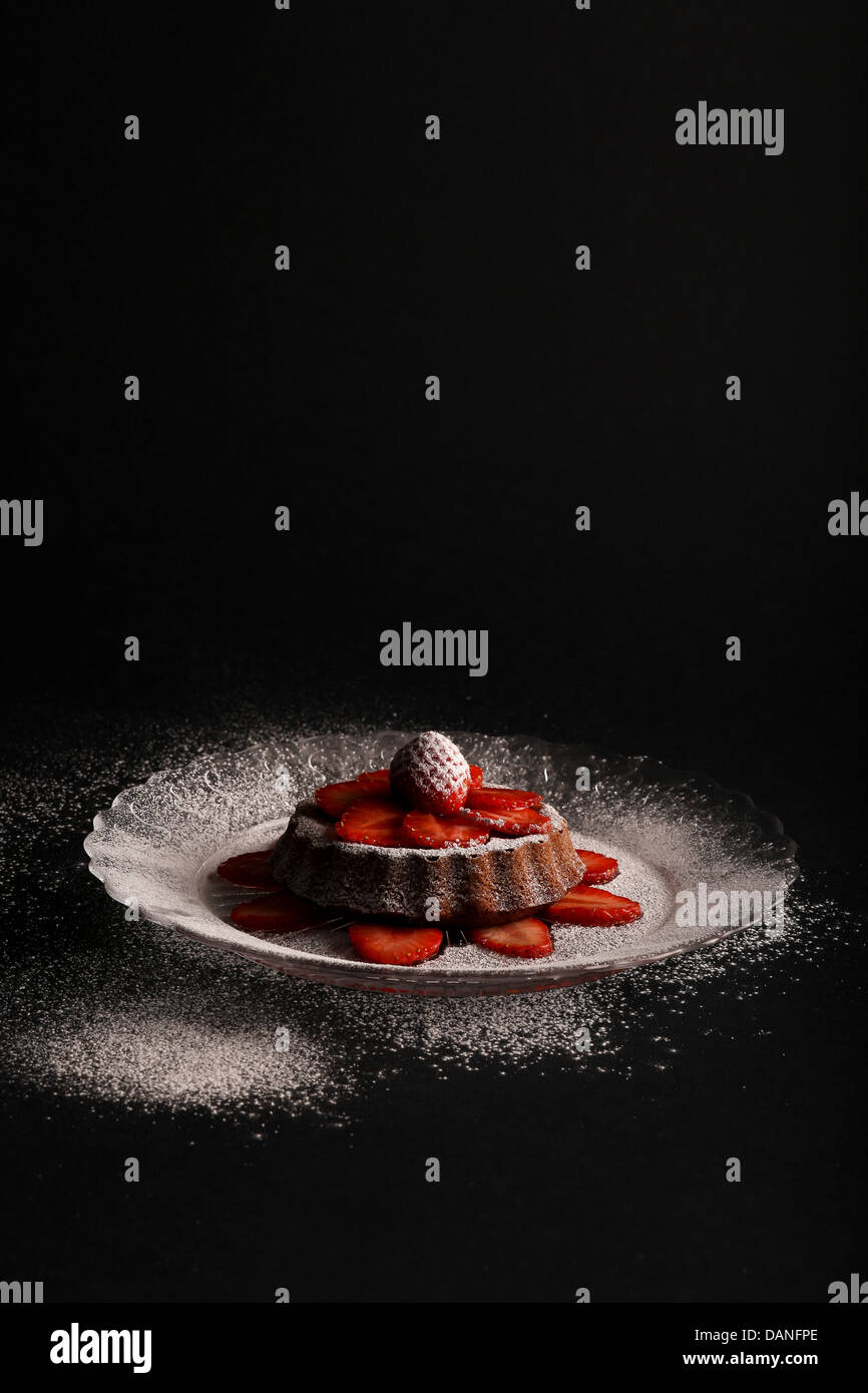 Lemon vanilla mini sponge cake with strawberry on top and sliced ...