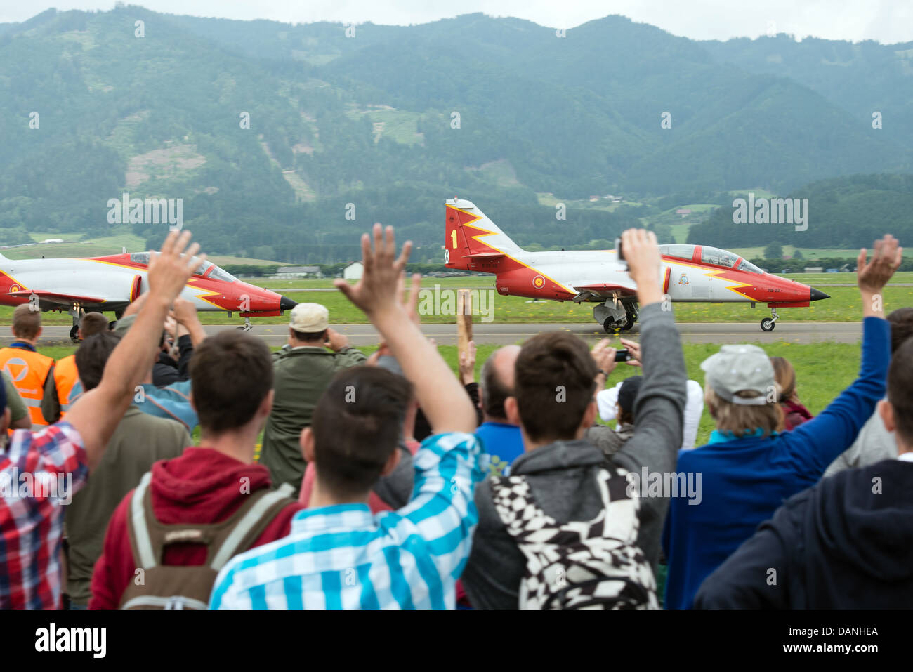 Spectators greet members of Spanish aerobatics display team Patrulla ...