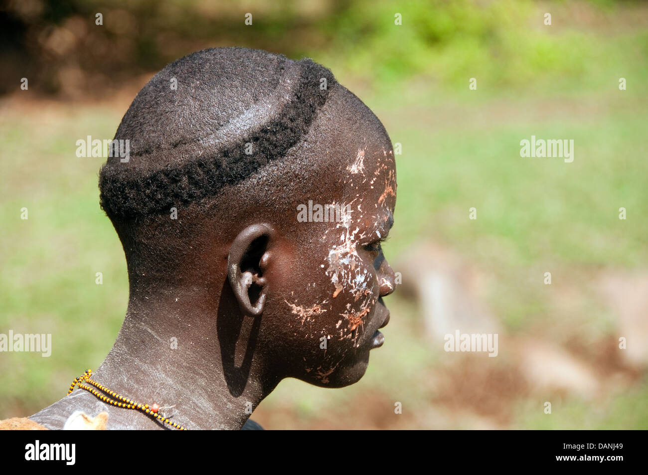 A Suri (Surma) man after body painting with colored mud, Ethiopia Stock ...