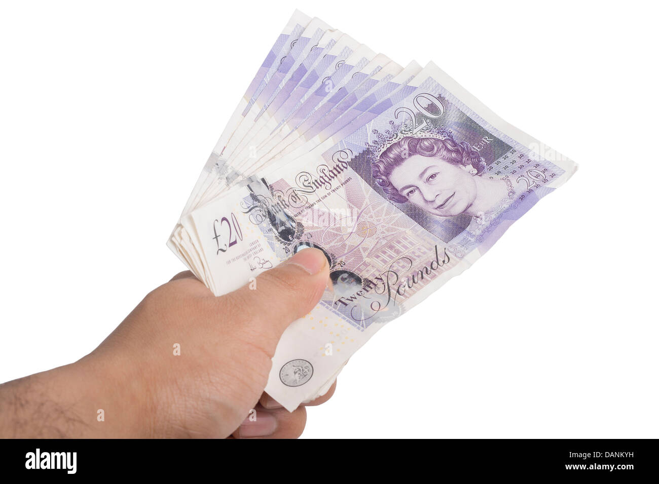 Man holding British notes (twenty pounds), isolated on white Stock ...