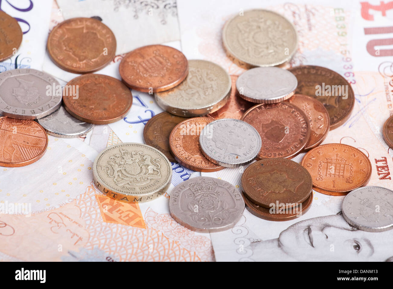 British pound notes and coins Stock Photo - Alamy