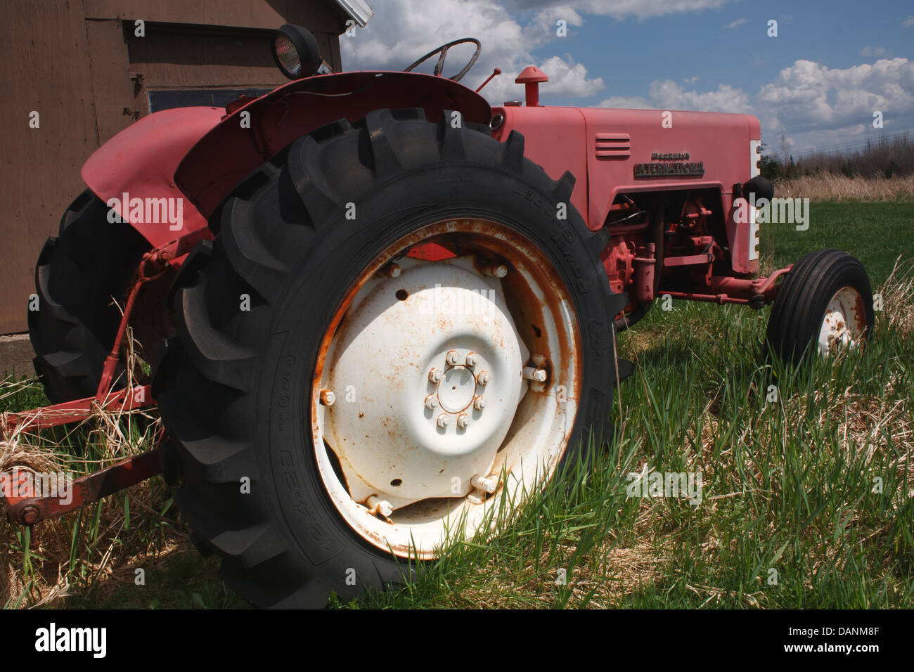 Closeup view of old farm tractor Stock Photo - Alamy
