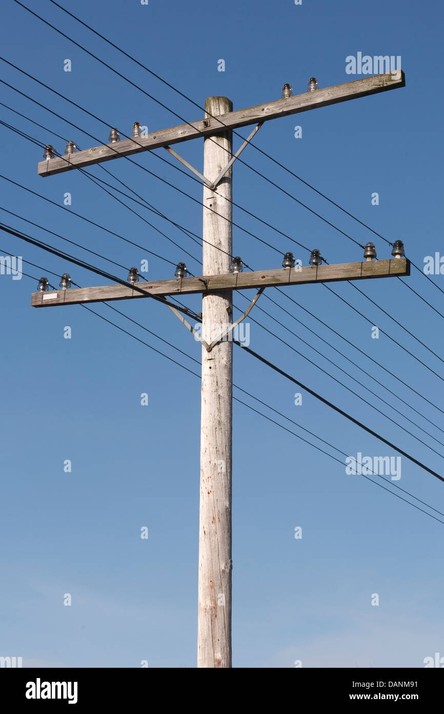 Telephone pole and clear blue sky Stock Photo - Alamy