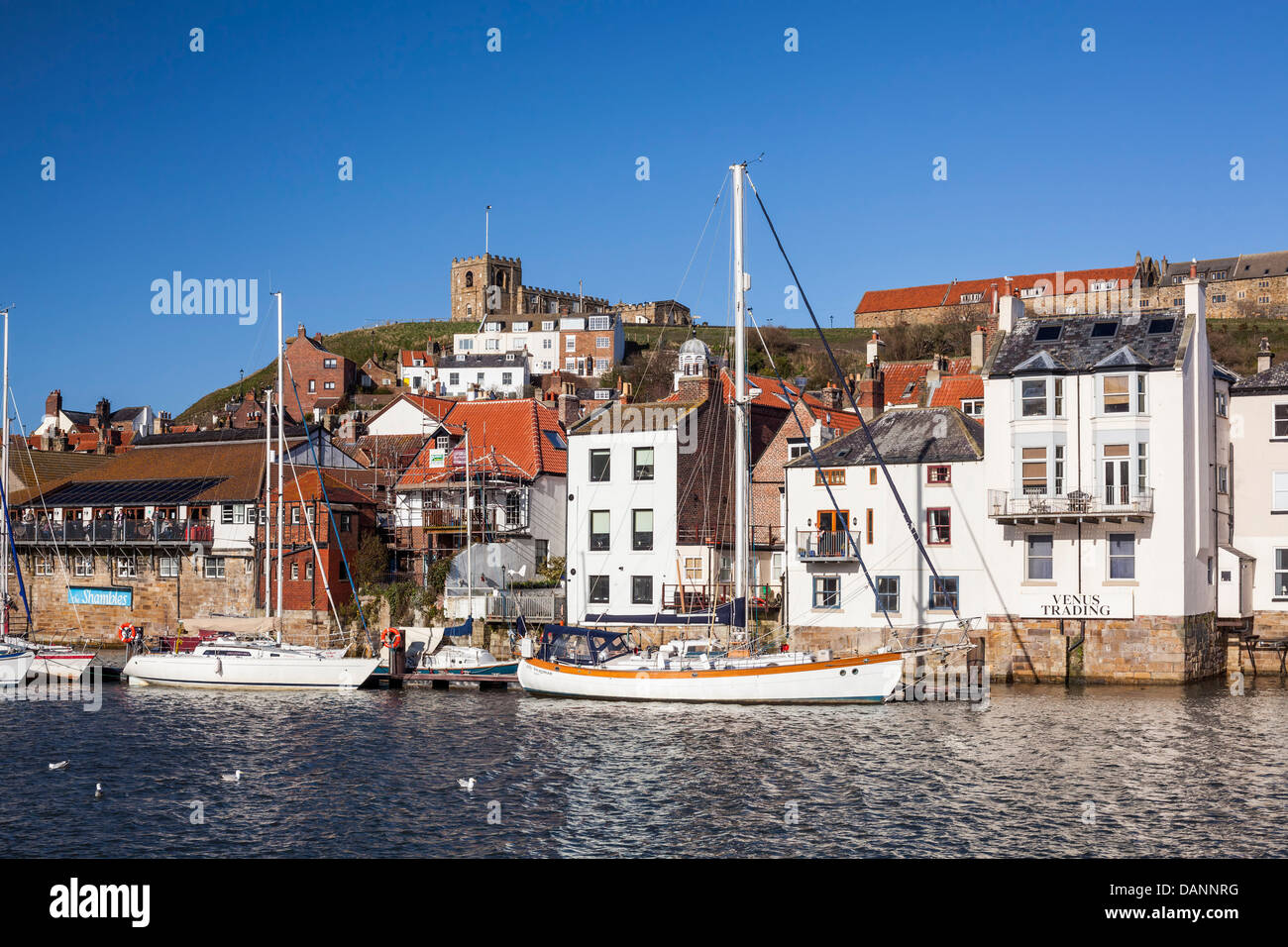 The Church of Saint Mary on the East Cliff overlooking Whitby Harbour ...