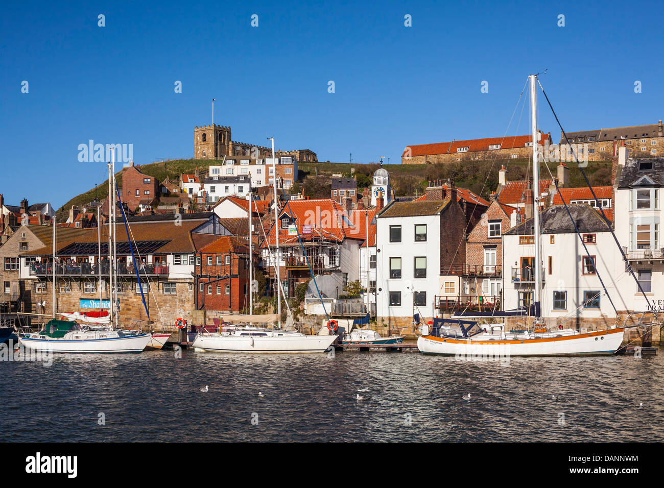 The Church of Saint Mary on the East Cliff overlooking Whitby Harbour ...